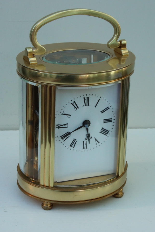 An Oval Cased Striking Carriage Clock - Blog